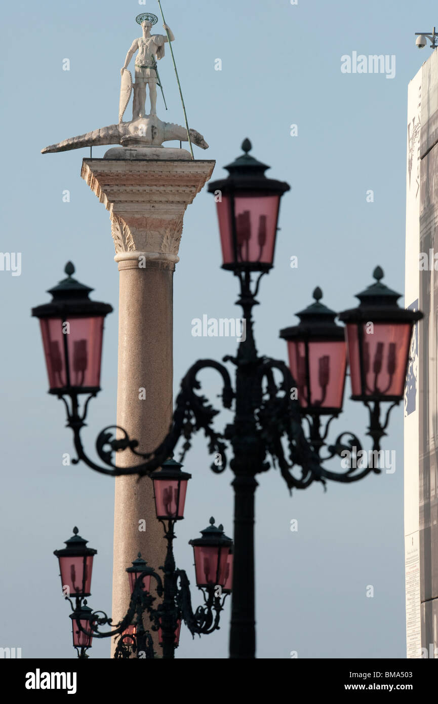 Statue and street light St Marks Square Venice Italy Stock Photo - Alamy