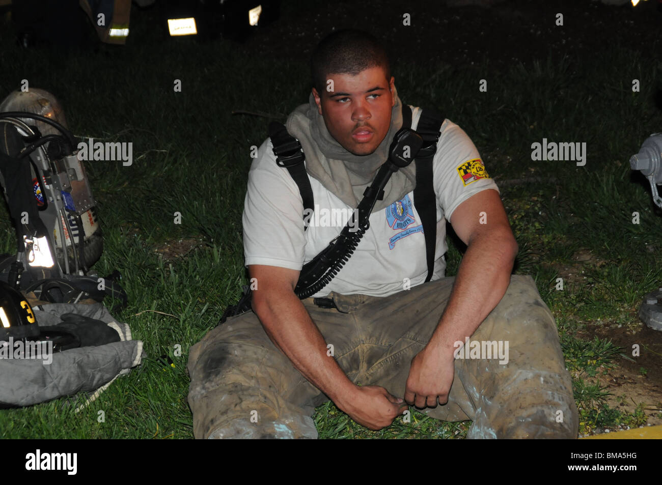 firefighter takes a break after fighting a 3 alarm fire Stock Photo - Alamy
