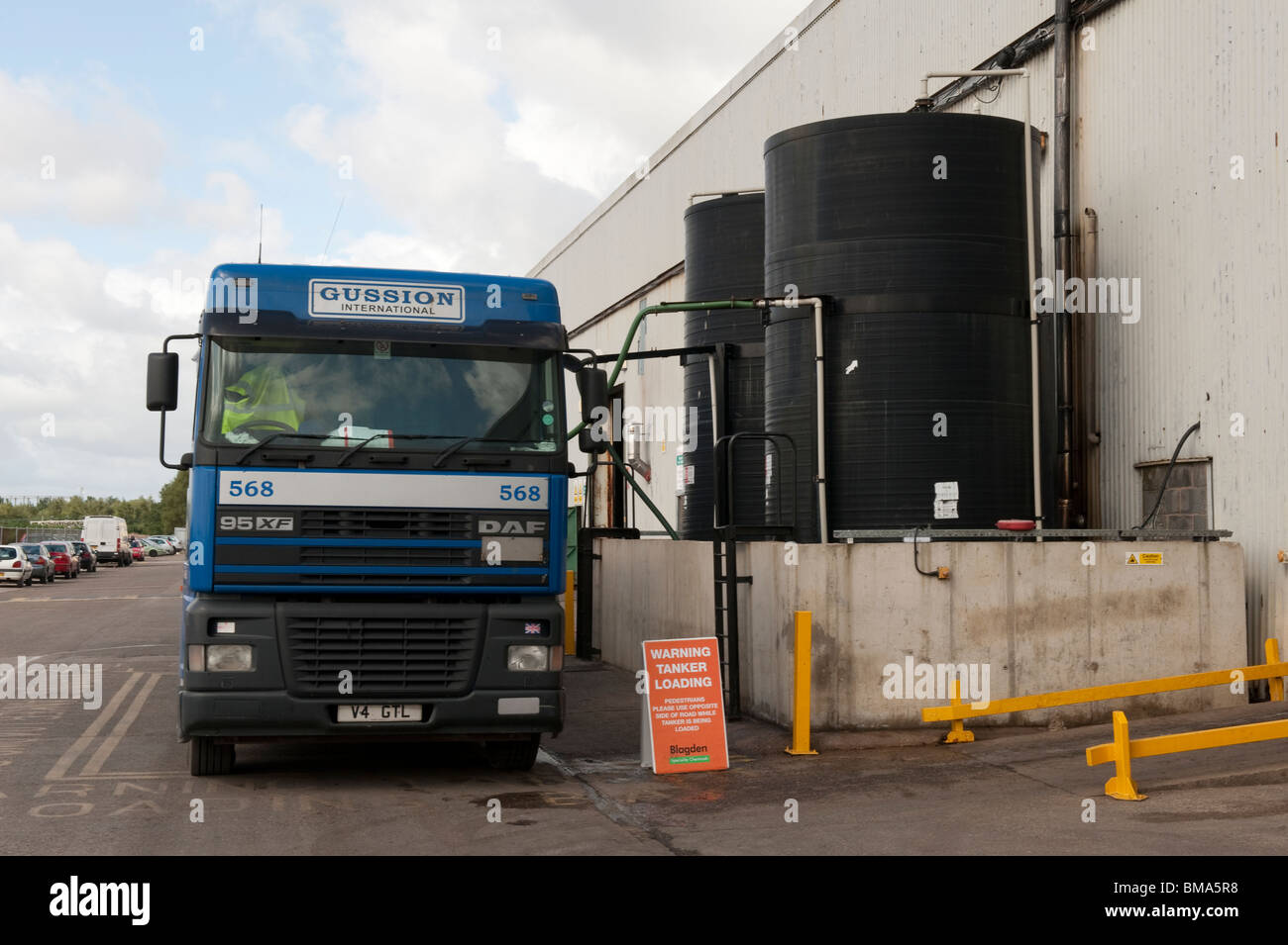 Chemical tanker unloading acid at factory Stock Photo, Royalty Free ...