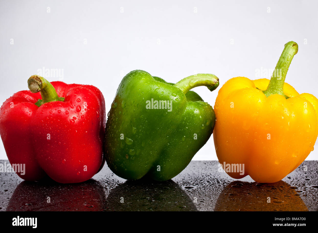 A red,green and yellow pepper Stock Photo - Alamy