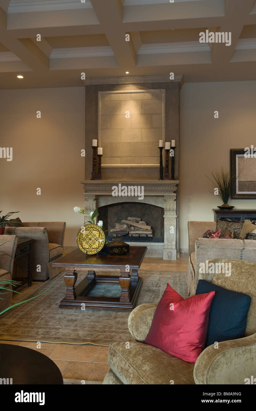 Darkly lit living room with fireplace Stock Photo - Alamy