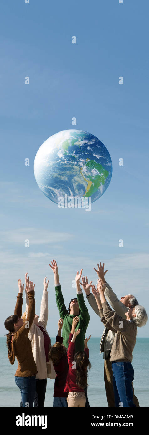 Ecology concept, group of people saving the earth together Stock Photo ...