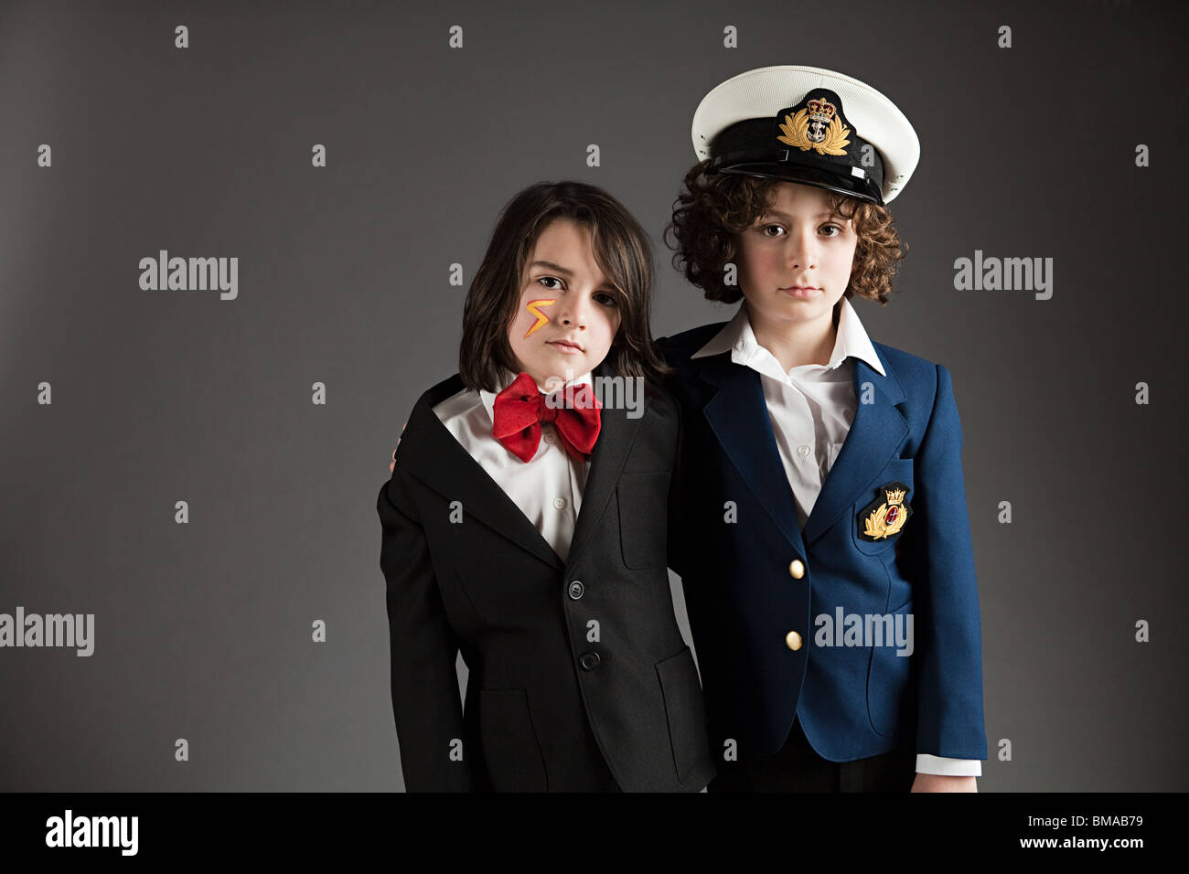 Young boys dressed up in sailor outfit and red bow tie Stock Photo - Alamy