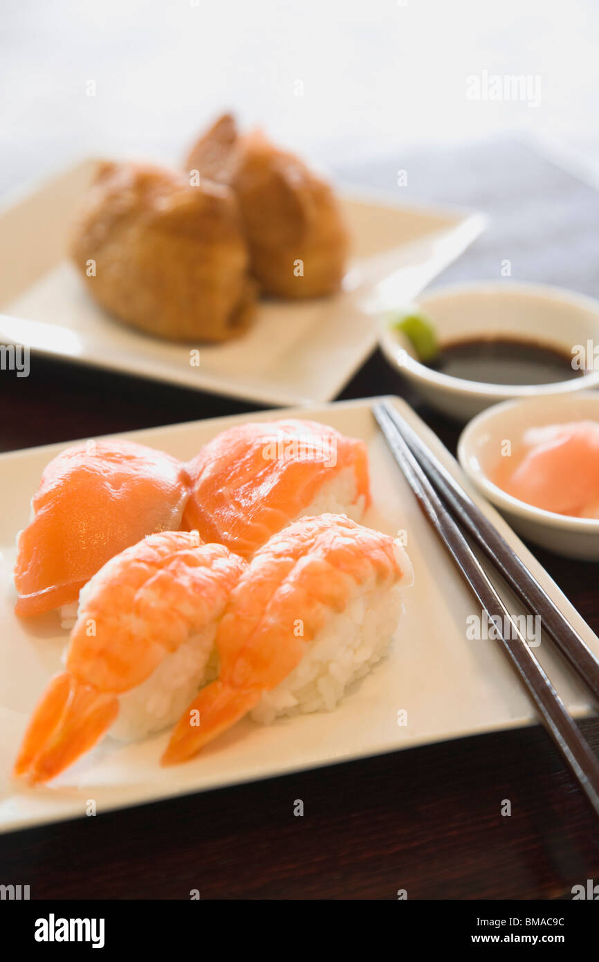 Sushi with Chopsticks Stock Photo - Alamy