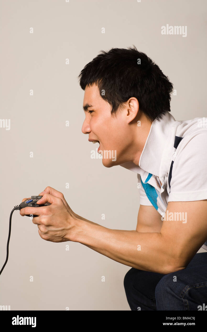 Man Playing Video Game Stock Photo - Alamy