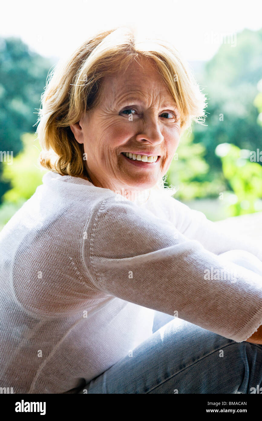 Portrait woman facing sideways hi-res stock photography and images - Alamy