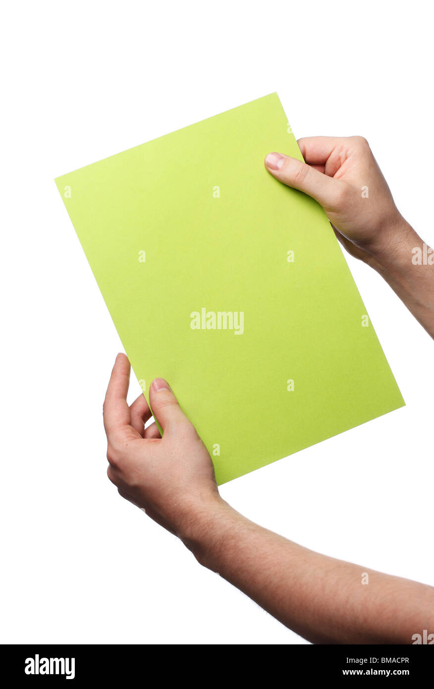 Man holding a green paper sheet Stock Photo - Alamy