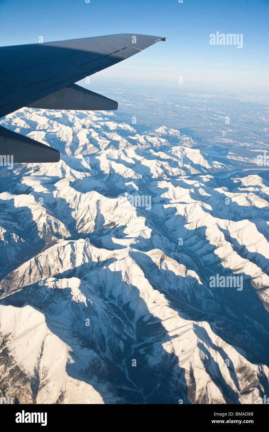 Airplane wing in flight rocky hi-res stock photography and images - Alamy