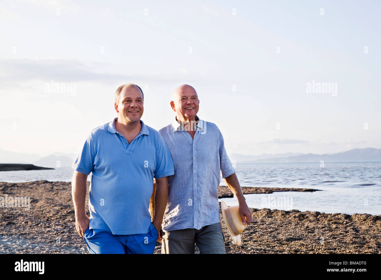 Men at Beach Stock Photo - Alamy