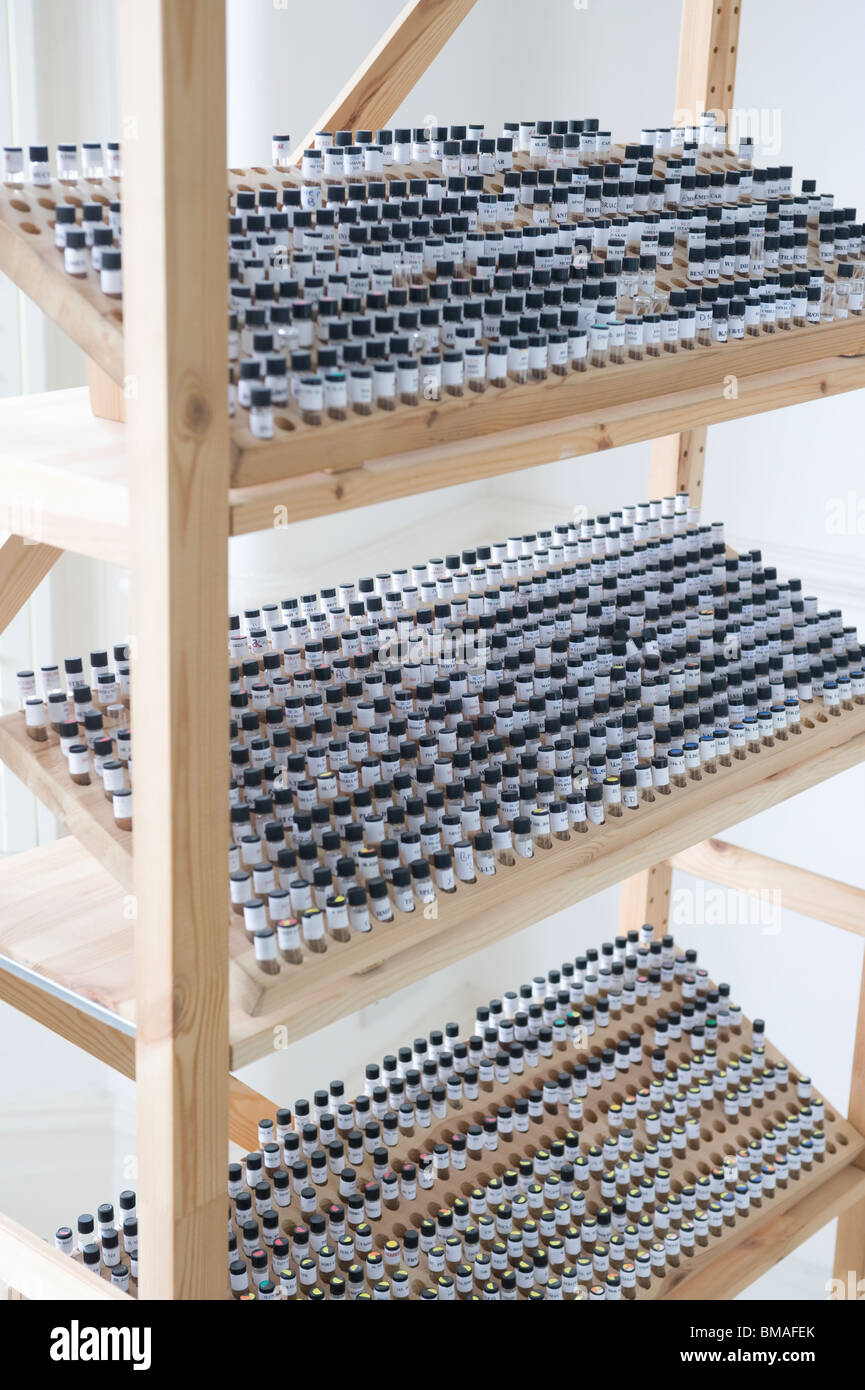 Vials in wooden stand Stock Photo - Alamy