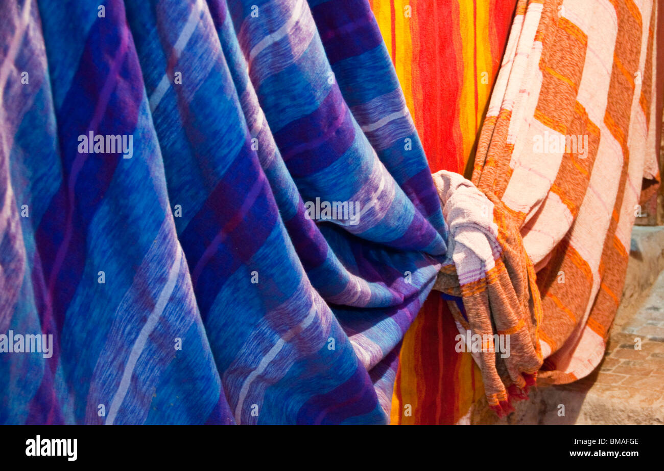 Morocco Fez Medina brightly coloured textiles for sale Stock Photo - Alamy