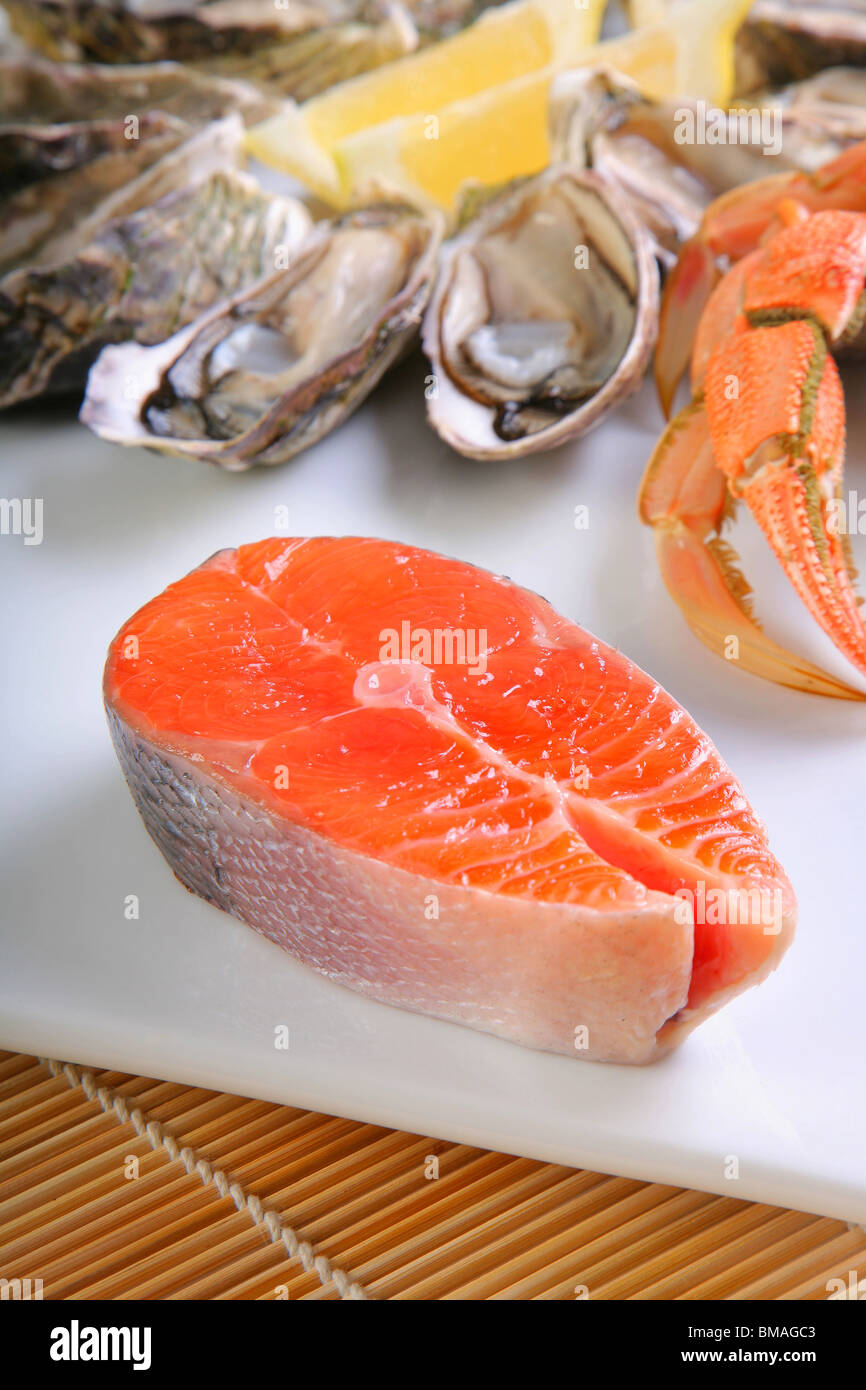 Atlantic salmon cutlet with crab and oysters Stock Photo - Alamy
