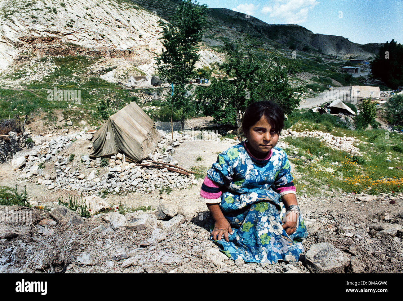 May 1992 Haran northern Iraq A Kurdish girl sits by the ruins of her ...
