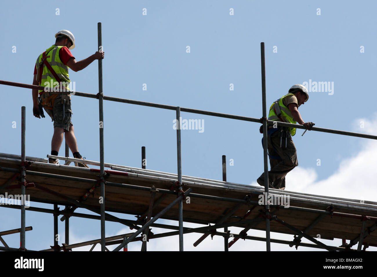 BUILDERS ON SCAFFOLD Stock Photo - Alamy