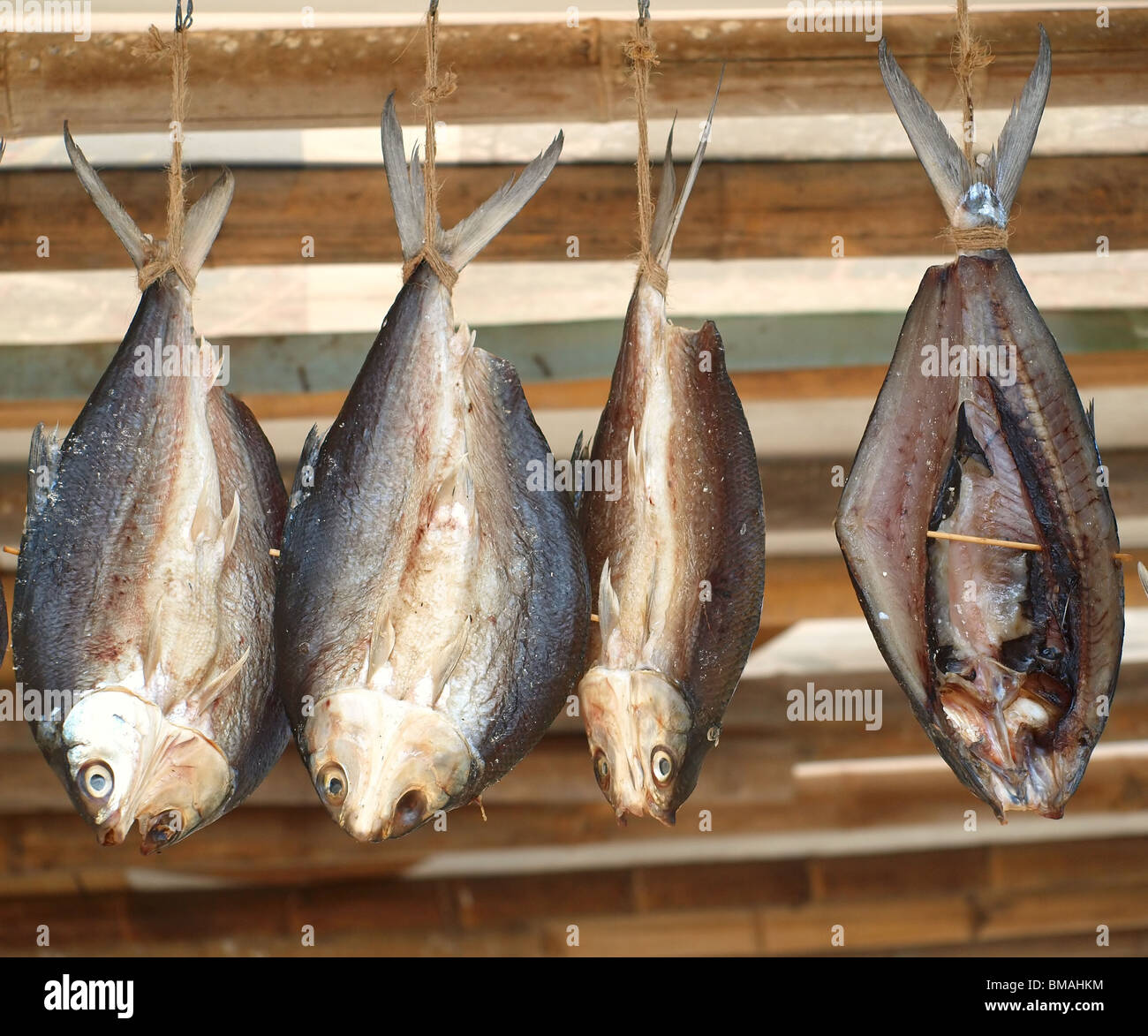 Filleted fish is drying from the rafters, a Taiwan specialty Stock ...