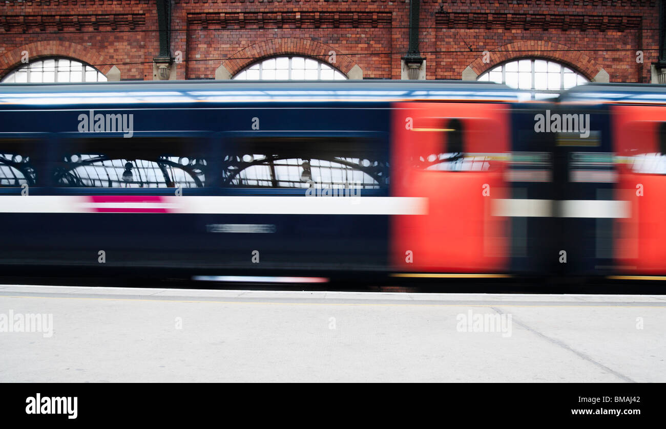 Train speeding through station hi-res stock photography and images - Alamy