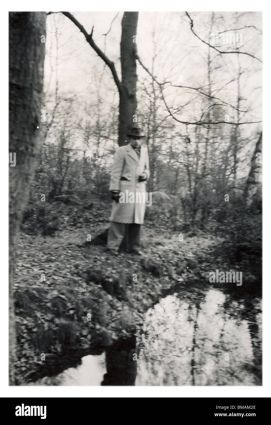 Old trench coat and hat hi-res stock photography and images - Alamy