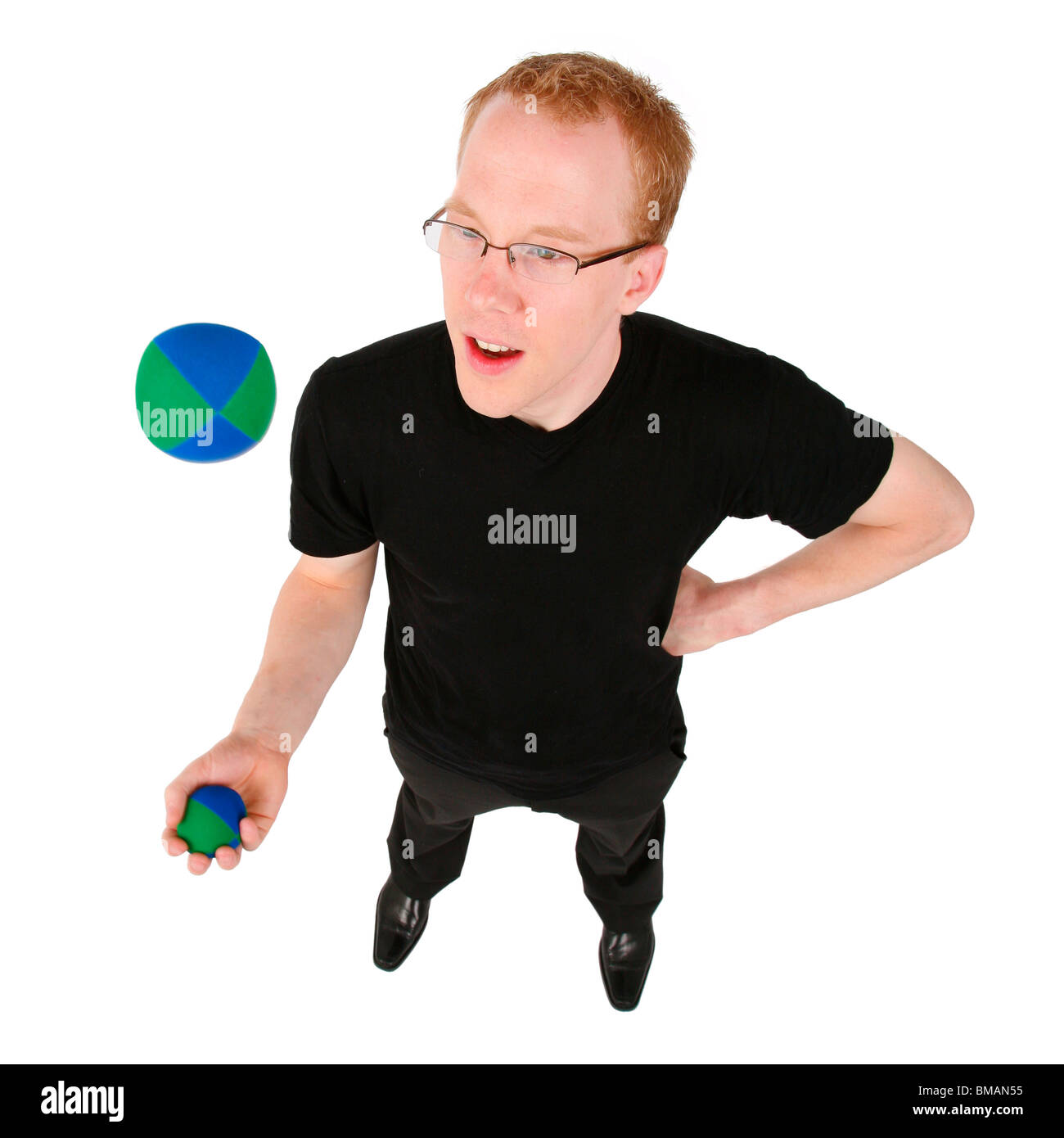 Two balls man hand hi-res stock photography and images - Alamy