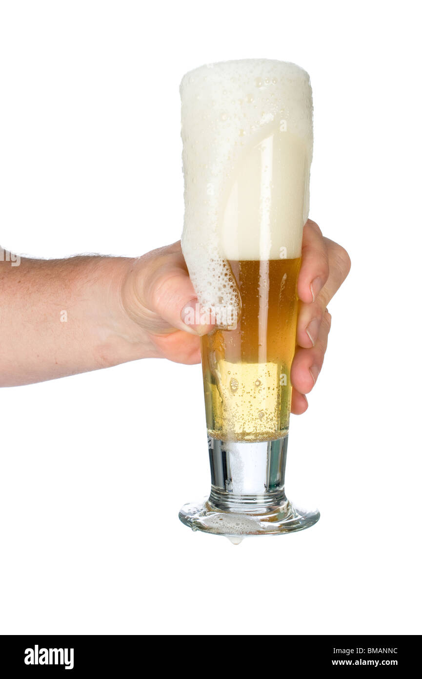 A man holds a glass of cold, frothy beer in a pilsner glass Stock Photo ...