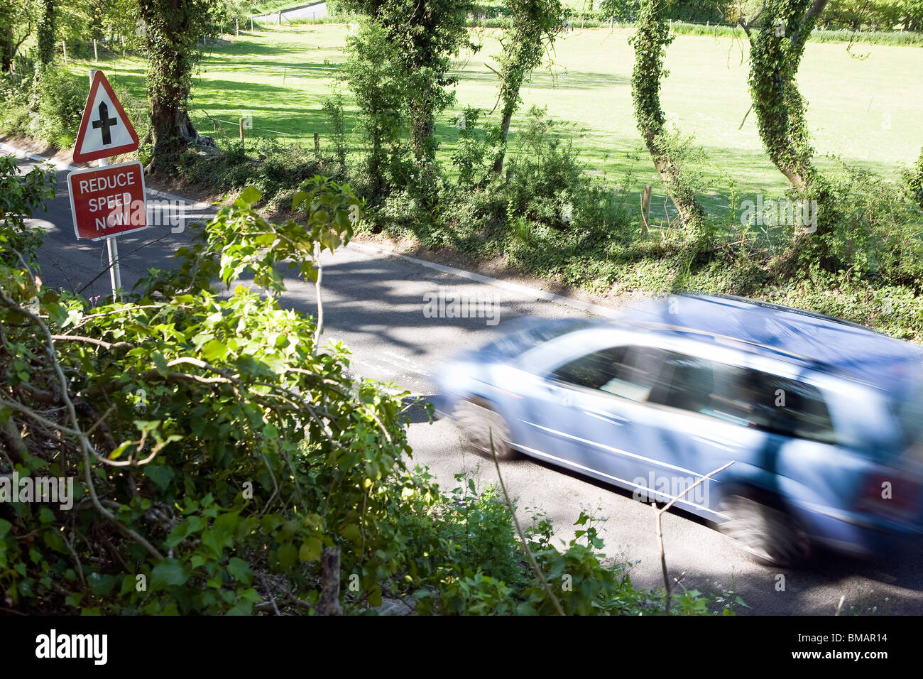 Reduce speed sign hi-res stock photography and images - Alamy