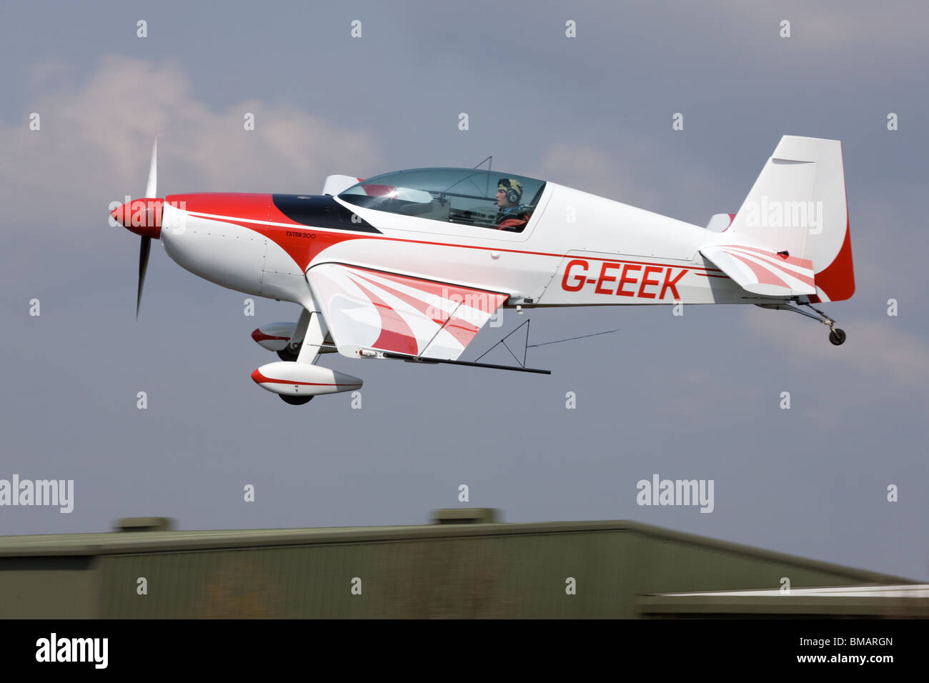 Extra EA300-200 G-EEEK on final approach to land at Sandtoft Airfield ...