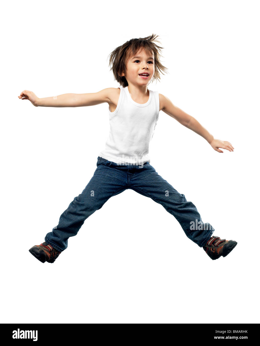 young boy jumping Stock Photo - Alamy