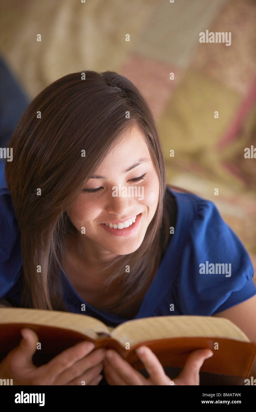 A Young Woman Reading Her Bible Stock Photo - Alamy