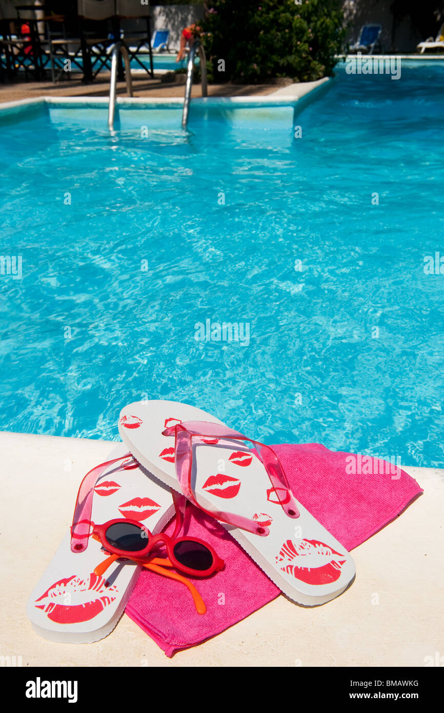 Summer vacation at the swimming pool with attributes Stock Photo - Alamy