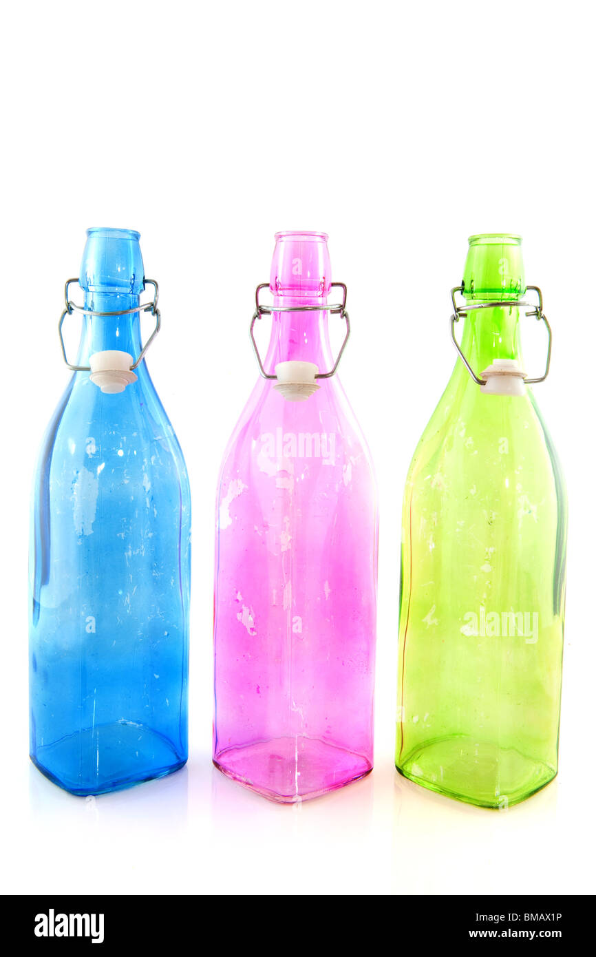 empty colorful glass bottles in colors isolated over white Stock Photo ...