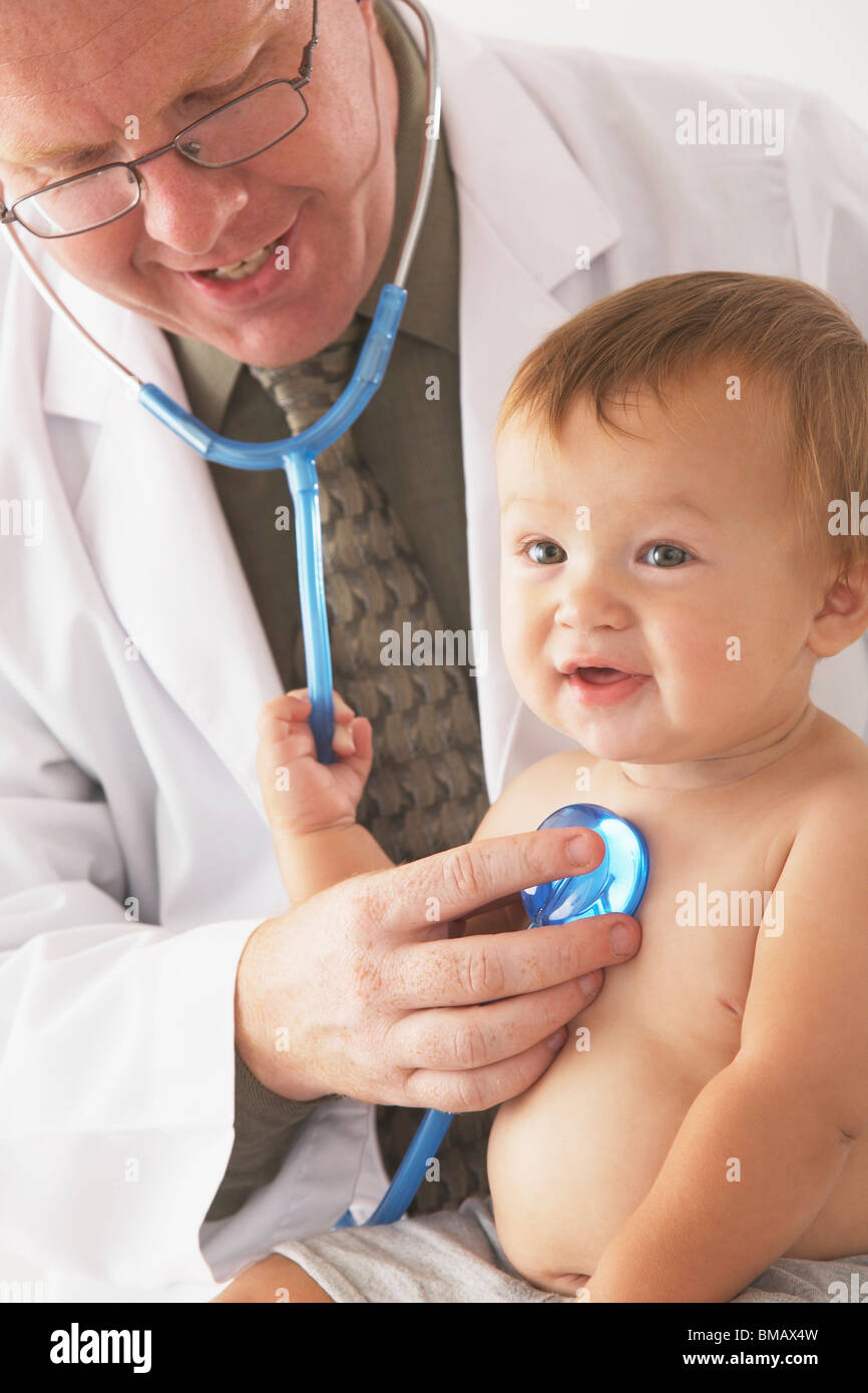 A Pediatrician Examining A Baby Stock Photo - Alamy