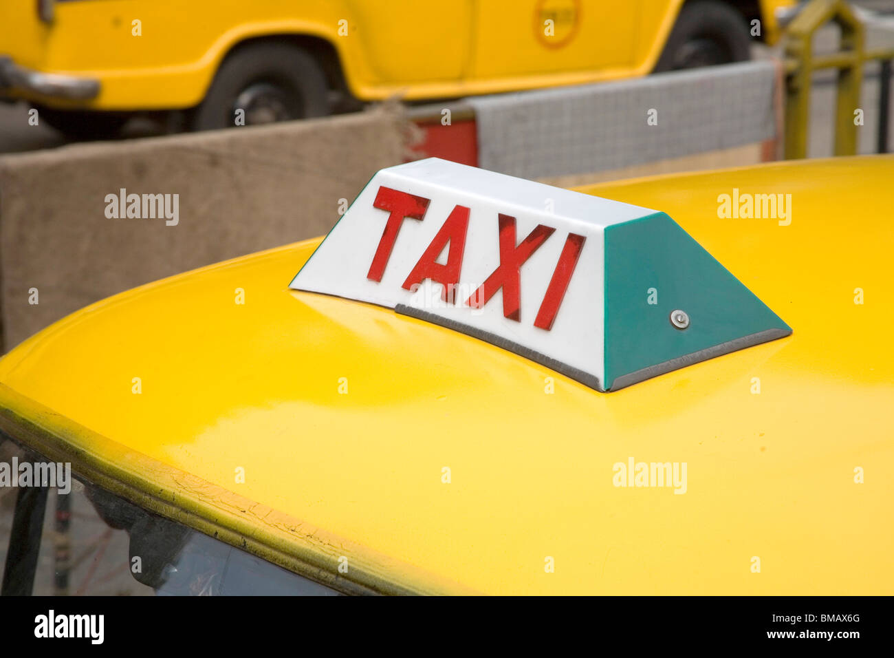 Yellow color taxi sign board on top ; Calcutta now Kolkata ; West ...