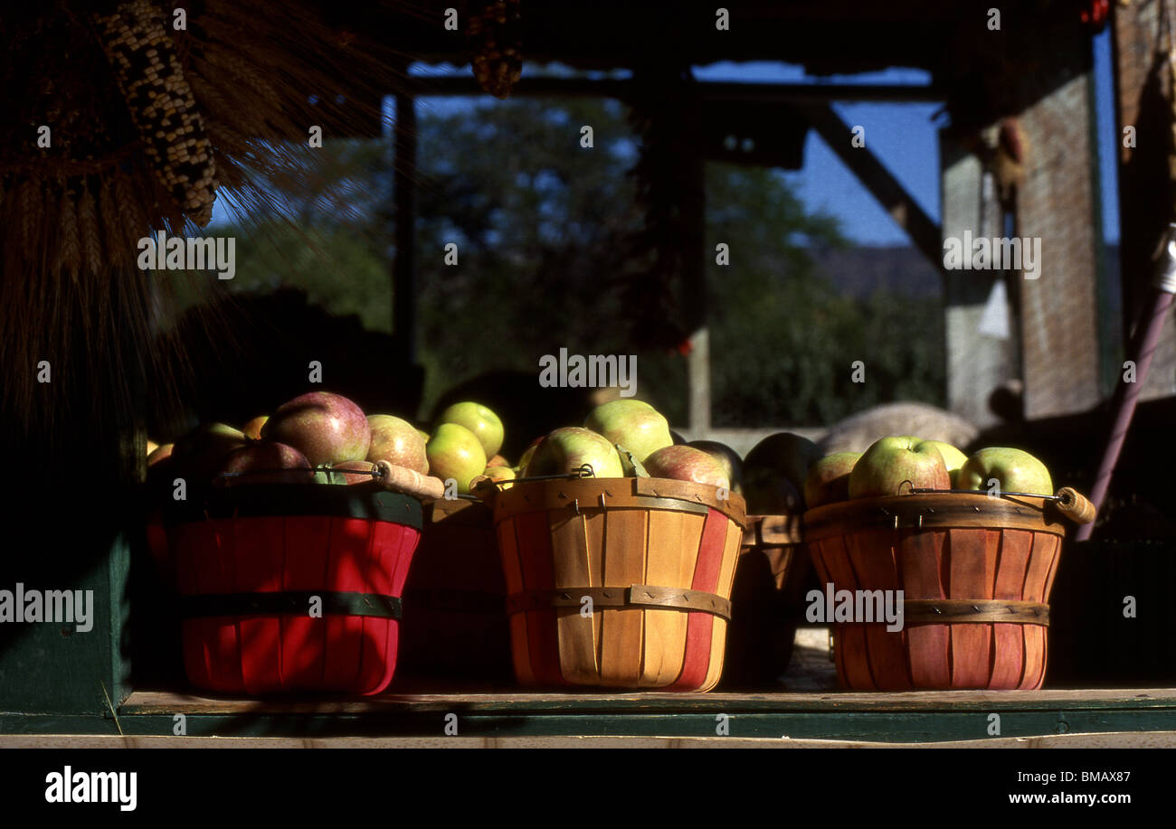 Baskets of apples are for sale at a roadside stand in Rincanado, New ...