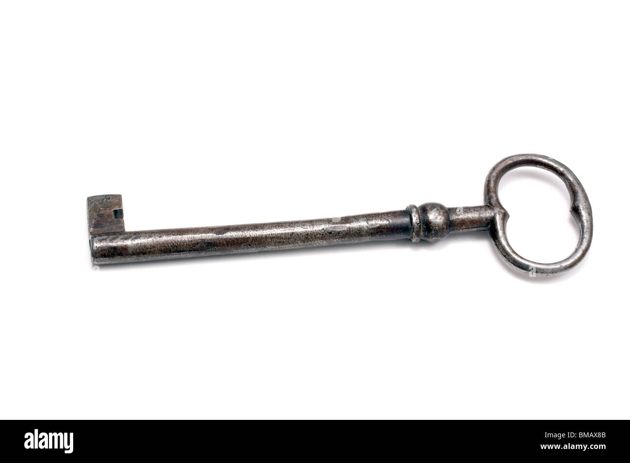 Old key isolated on white background Stock Photo - Alamy