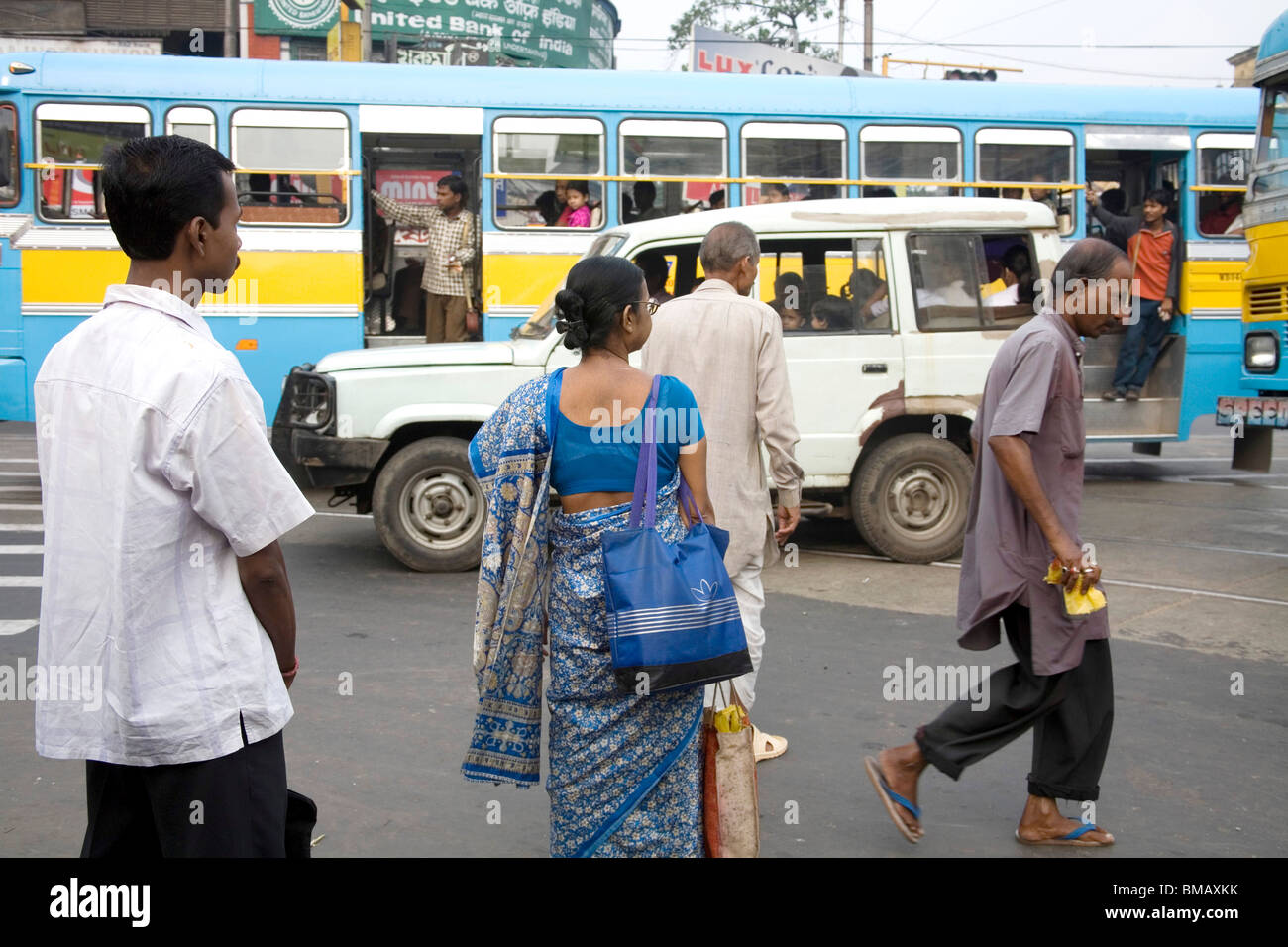 Indian woman crossing street hi-res stock photography and images - Alamy