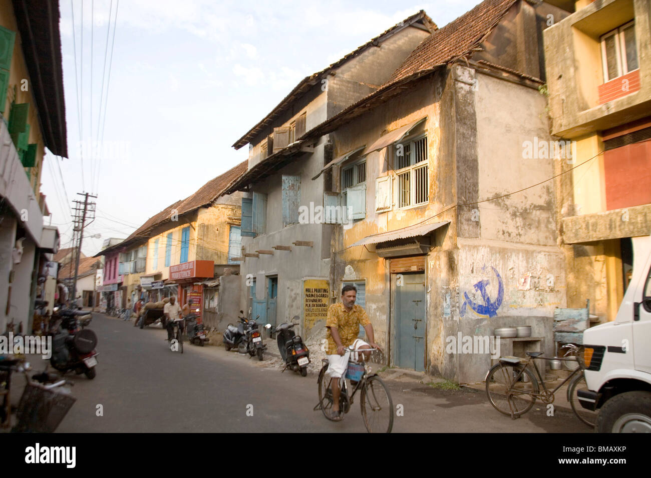 Street scene man riding bicycle ; Mattancherry ; Cochin now Kochi ...