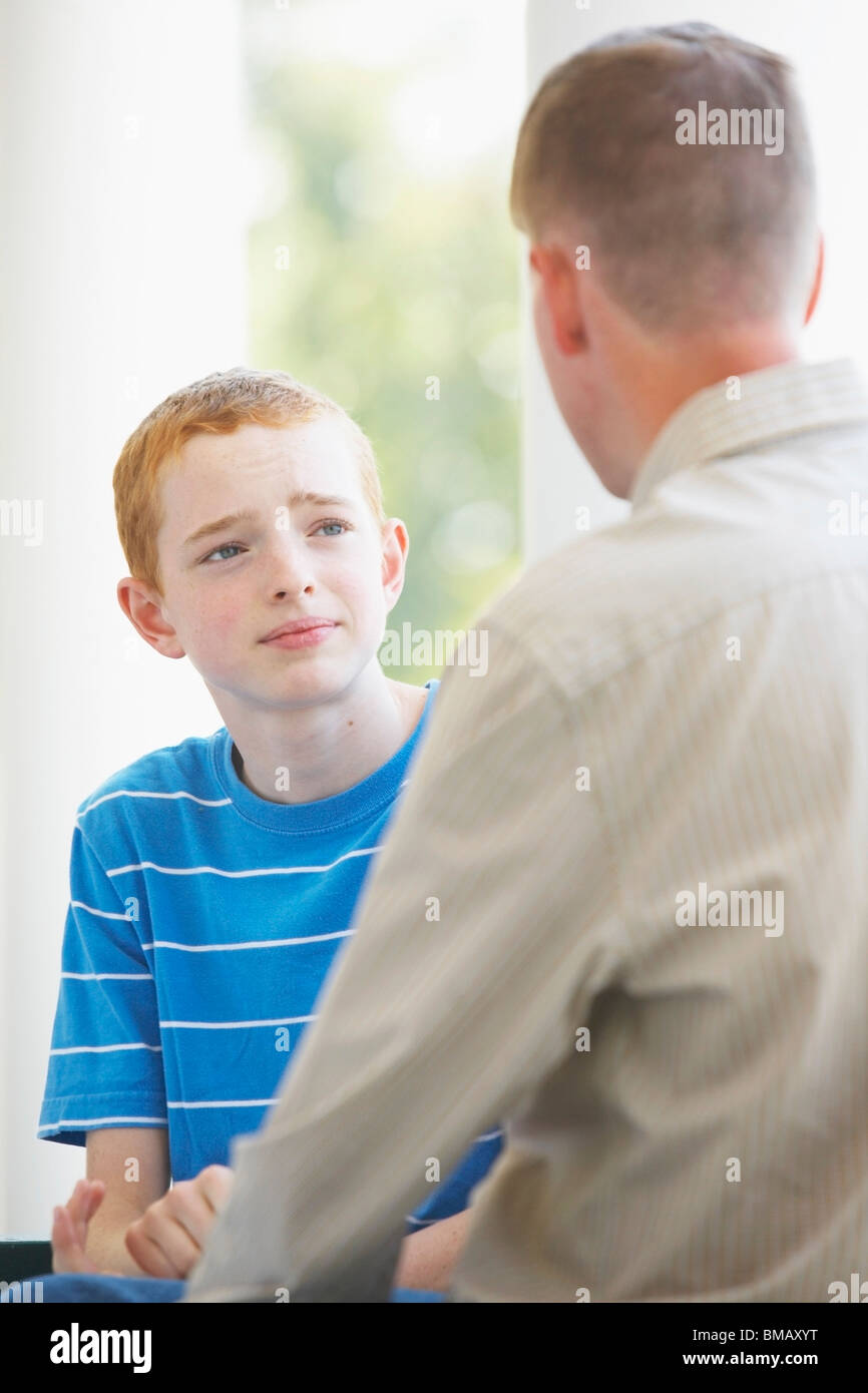 A Father And Son Talking Stock Photo - Alamy