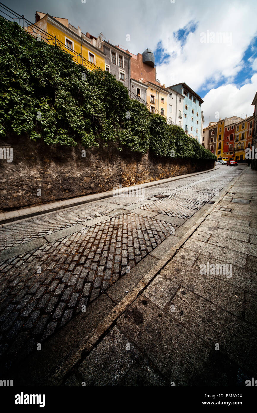 Typical street, with houses in different colors and the cobbled street ...