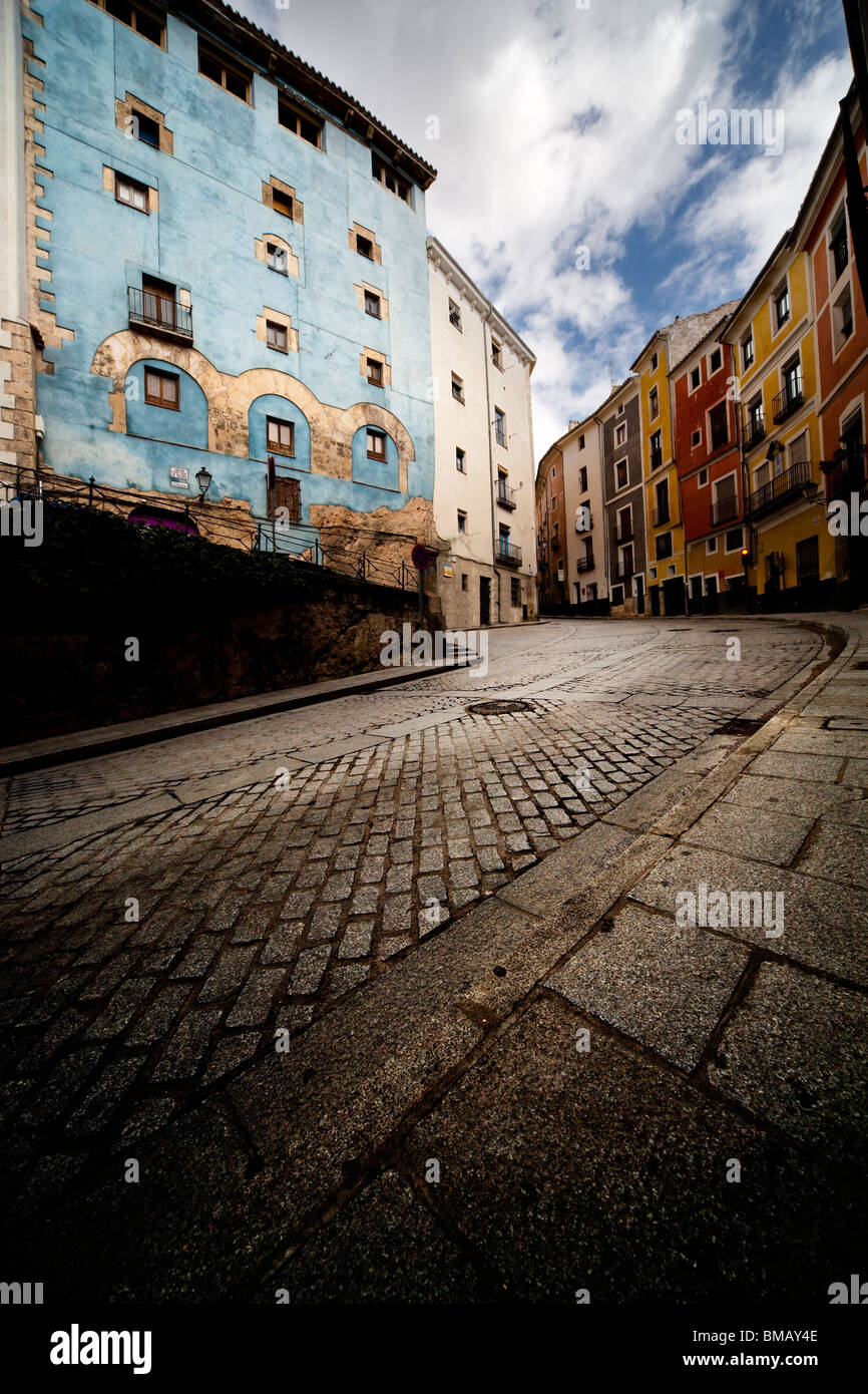 Typical street, with houses in different colors and the cobbled street ...