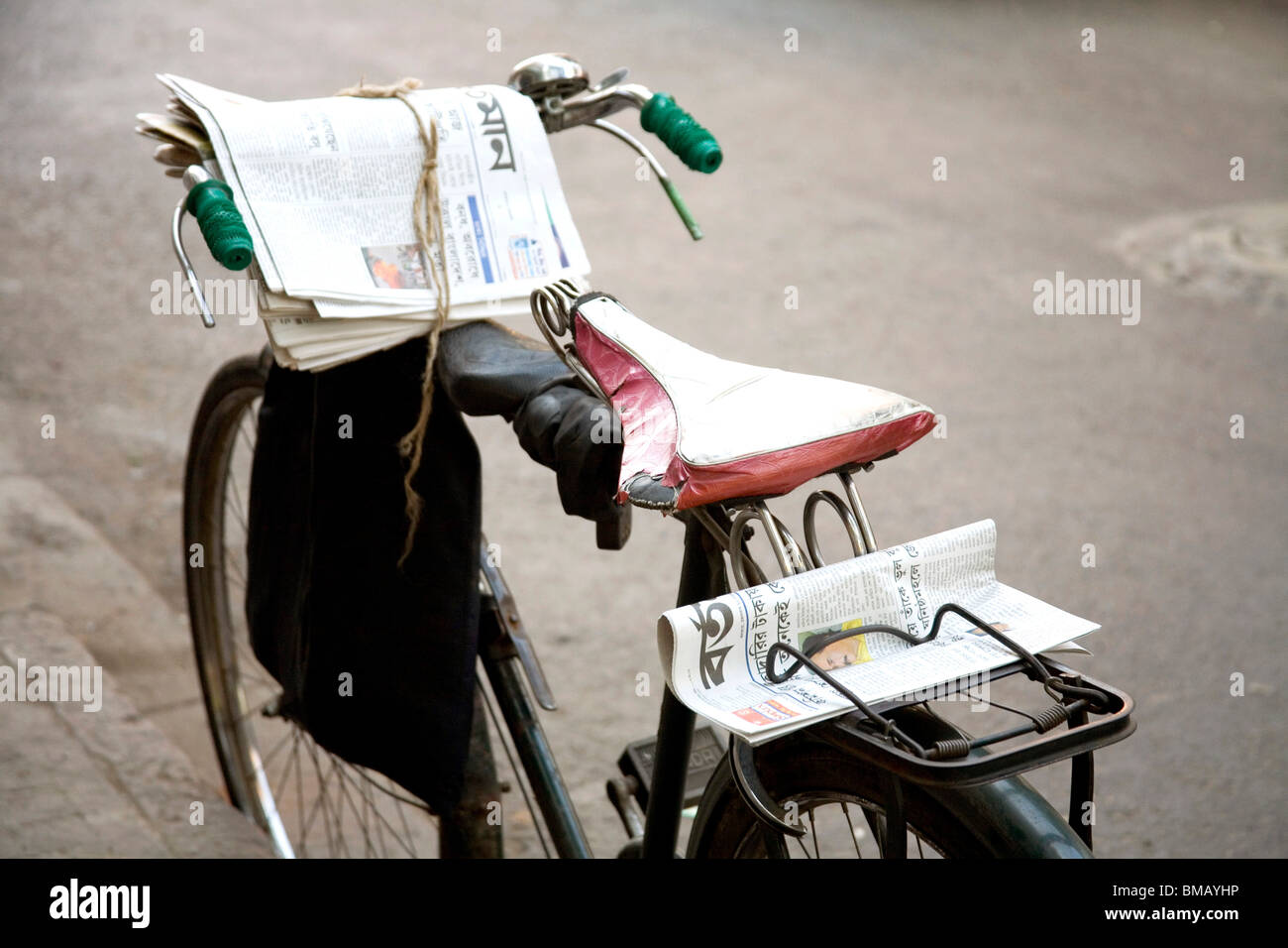 Newspapers on bicycle hi-res stock photography and images - Alamy