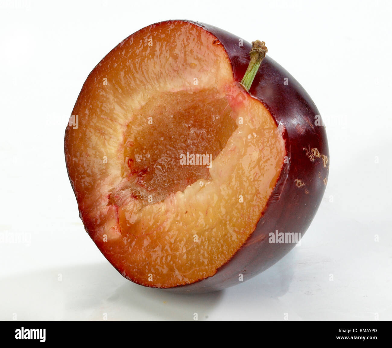 Half of plum hi-res stock photography and images - Alamy