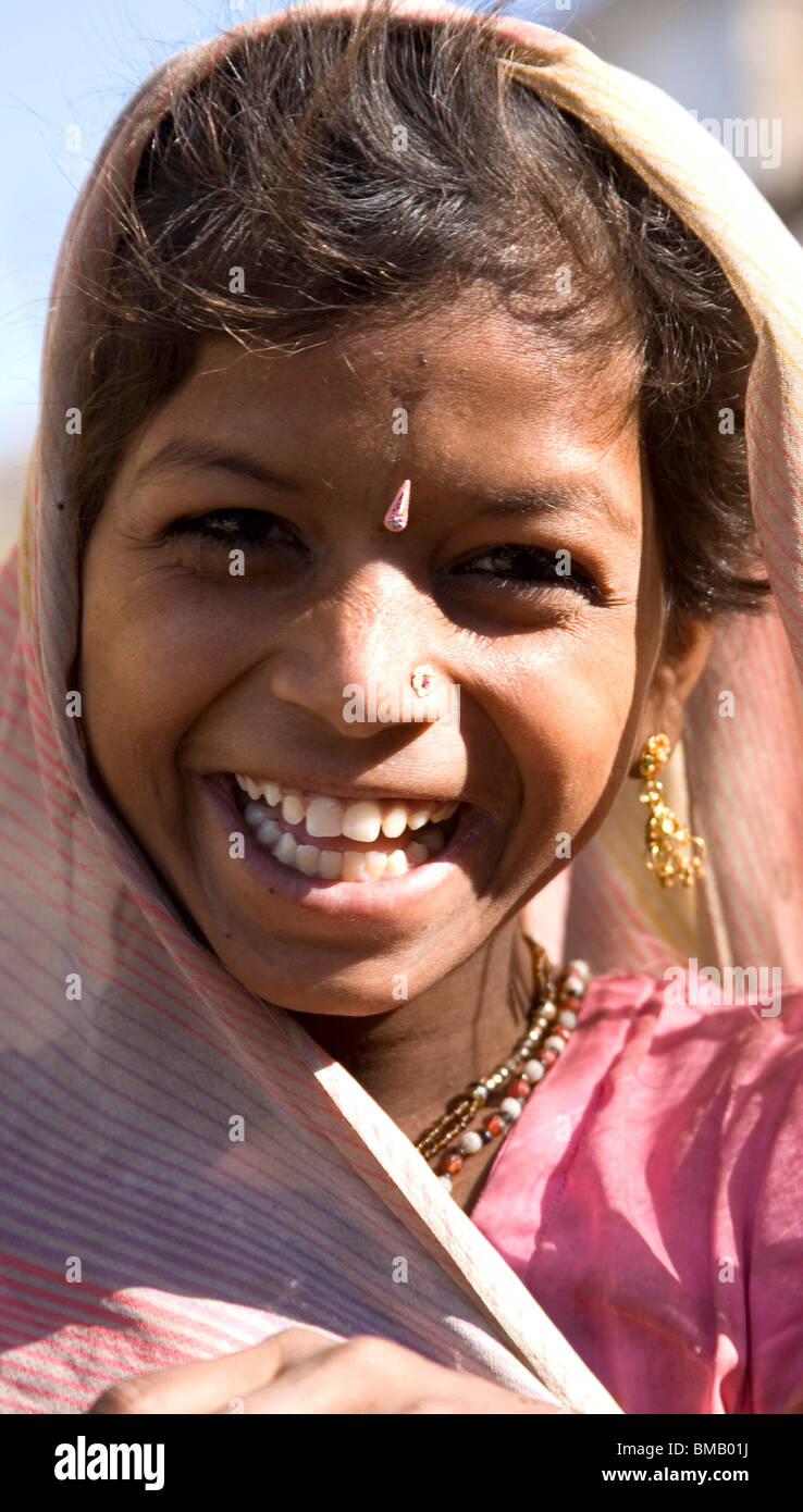 Rural girls laughing wearing Indian costume ; Bheel basti ; village ...