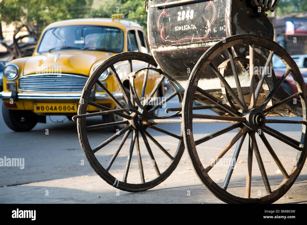 Street scene ; hand rickshaw's two wheels ; Calcutta now Kolkata ; West ...