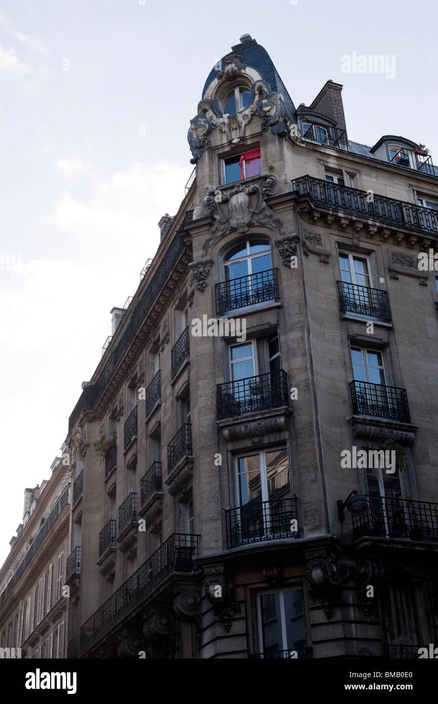 A corner building shows typical Parisian architecture Stock Photo - Alamy