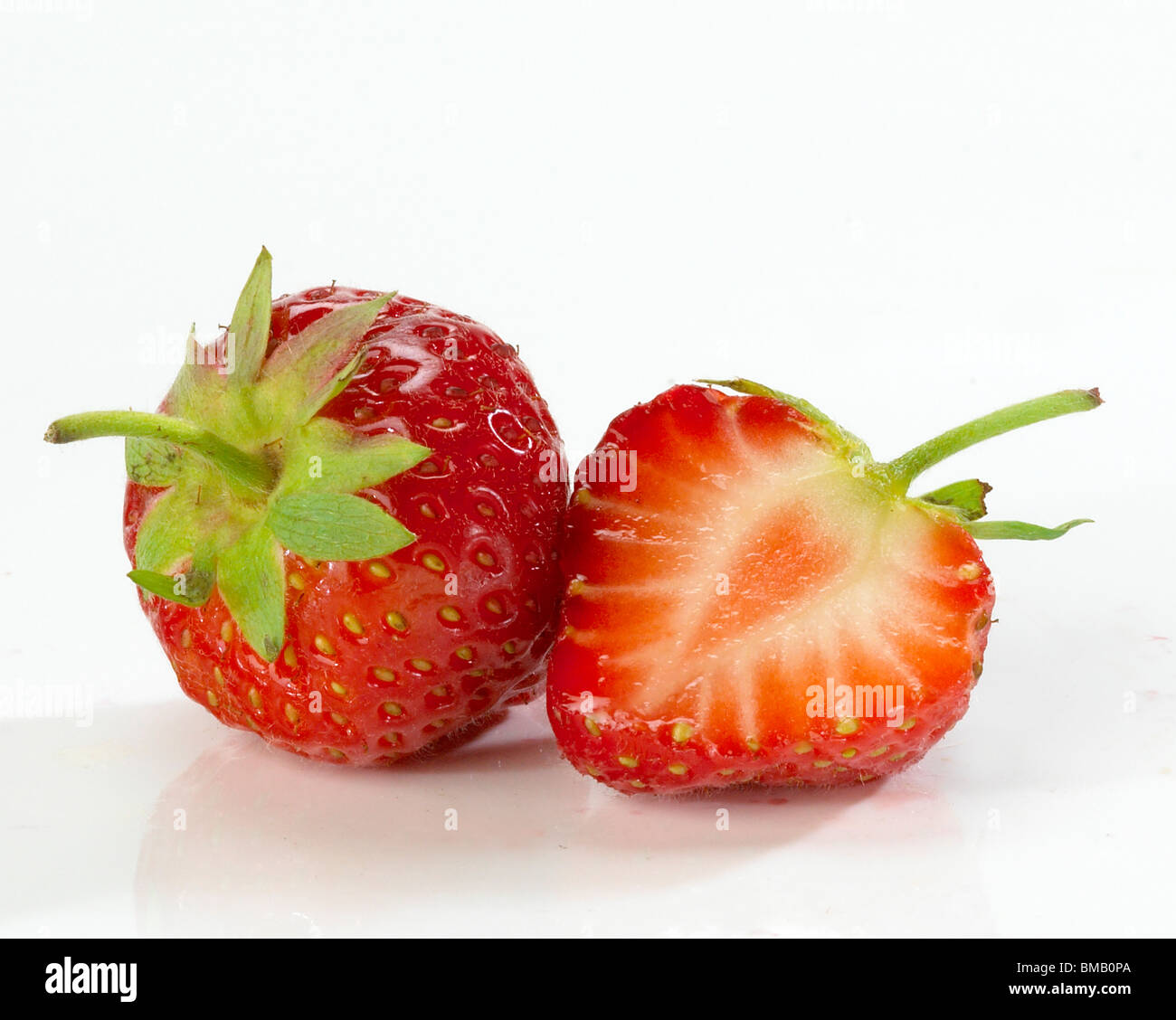 Strawberries halved hi-res stock photography and images - Alamy