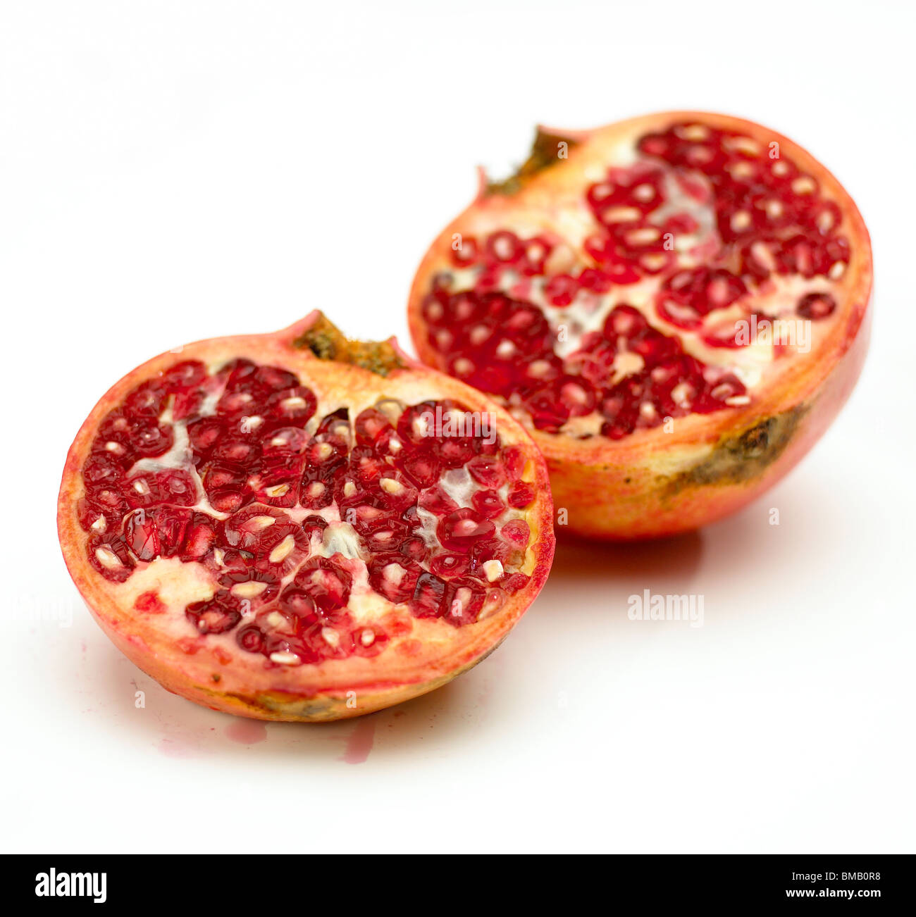 Half of pomegranate hi-res stock photography and images - Alamy