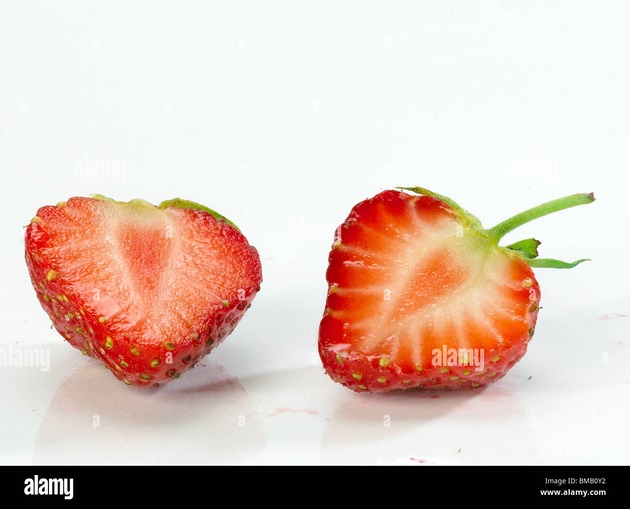 Strawberries halved hi-res stock photography and images - Alamy