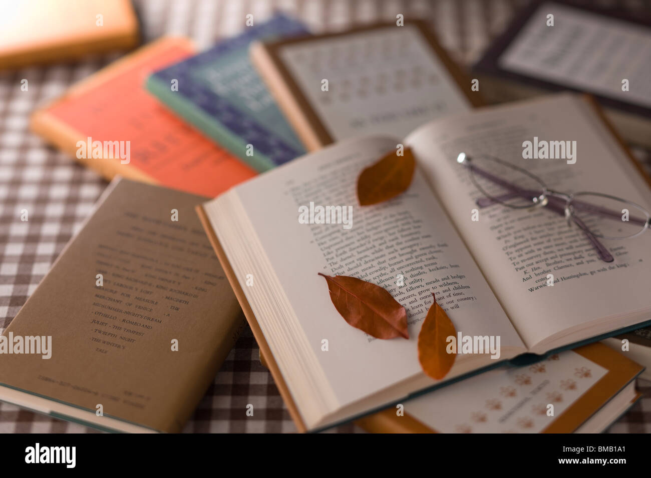 Book and Eyeglasses Stock Photo - Alamy