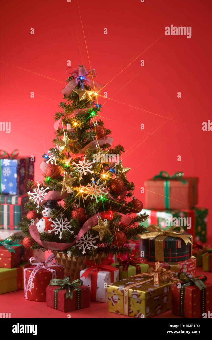 Christmas Tree and Present Stock Photo - Alamy