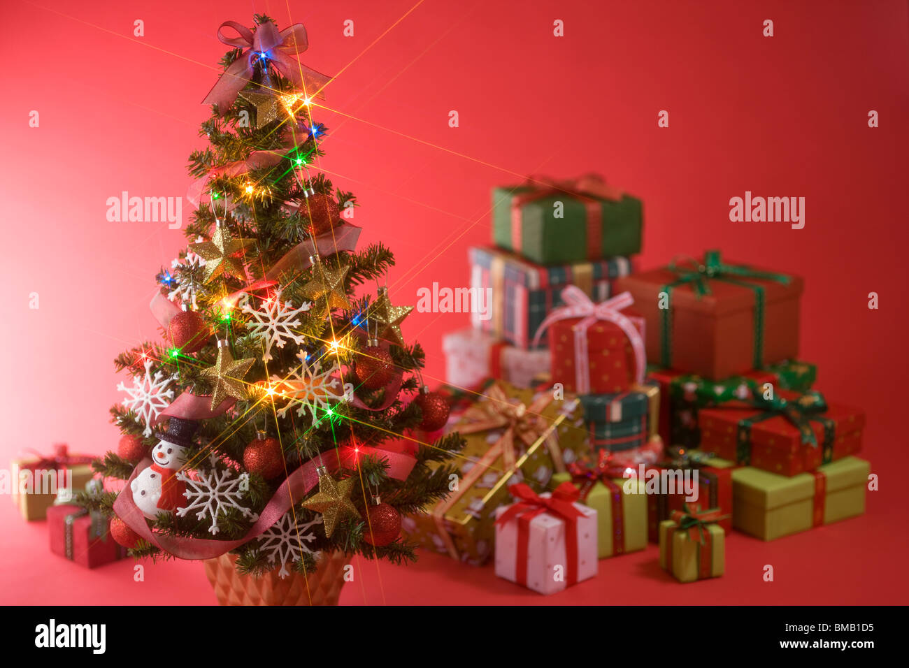 Christmas Tree and Present Stock Photo - Alamy