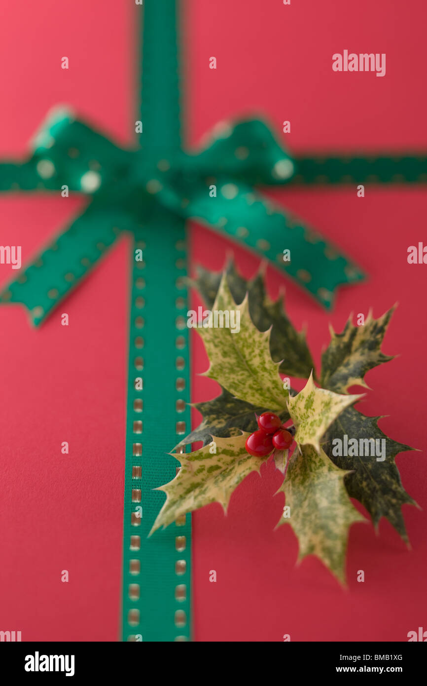 Holly and Ribbon Stock Photo - Alamy